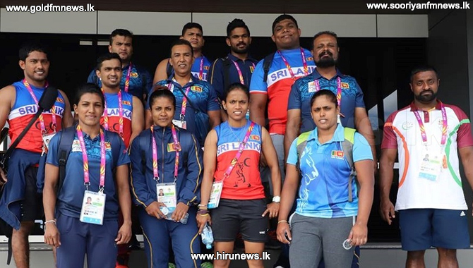Lankan weightlifting team arrives in Sri Lanka - Hiru News - Srilanka's ...