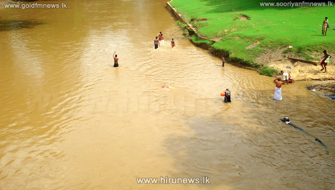 Woman falls pray to crocodile at Menik Ganga - Hiru News - Srilanka's ...